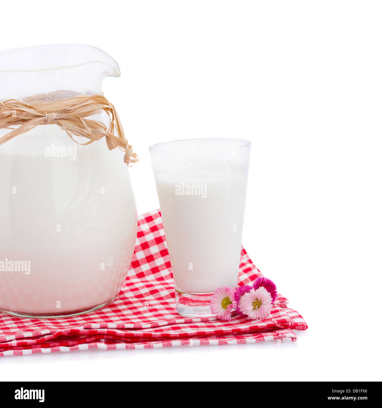 pitcher full of milk and glass Stock Photo - Alamy