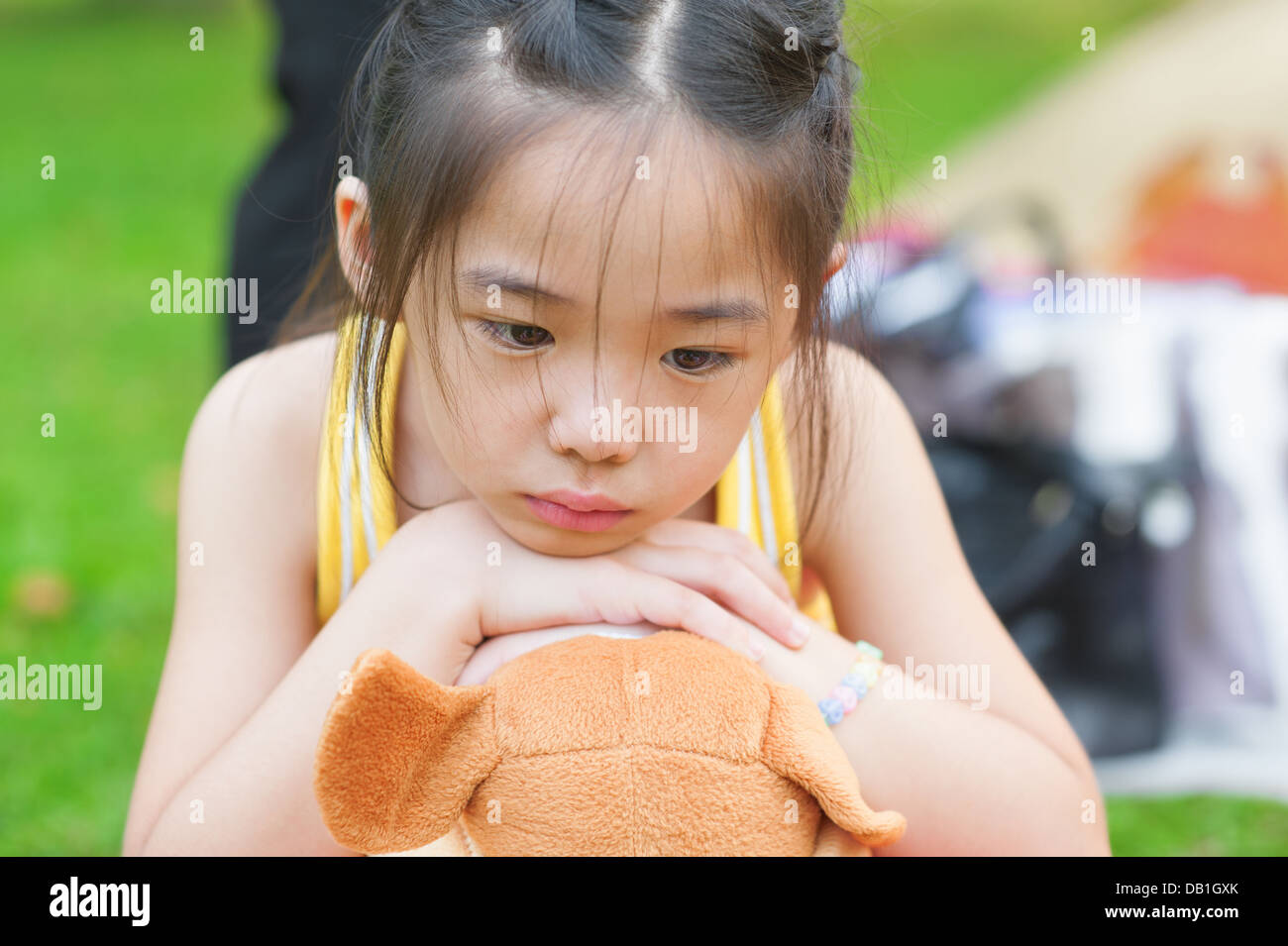 upset Asian child Stock Photo - Alamy