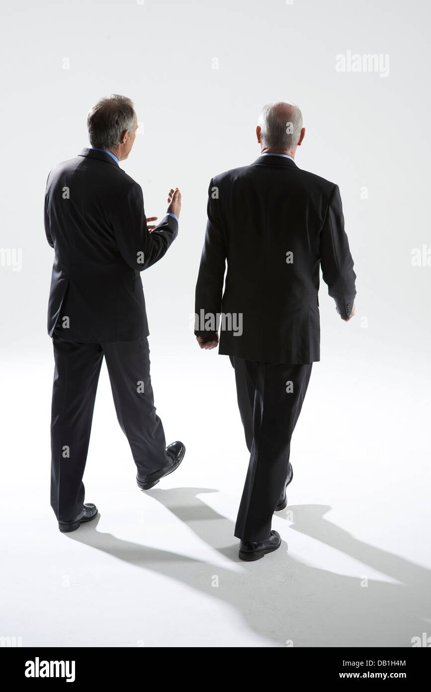 Two men walking hi-res stock photography and images - Alamy