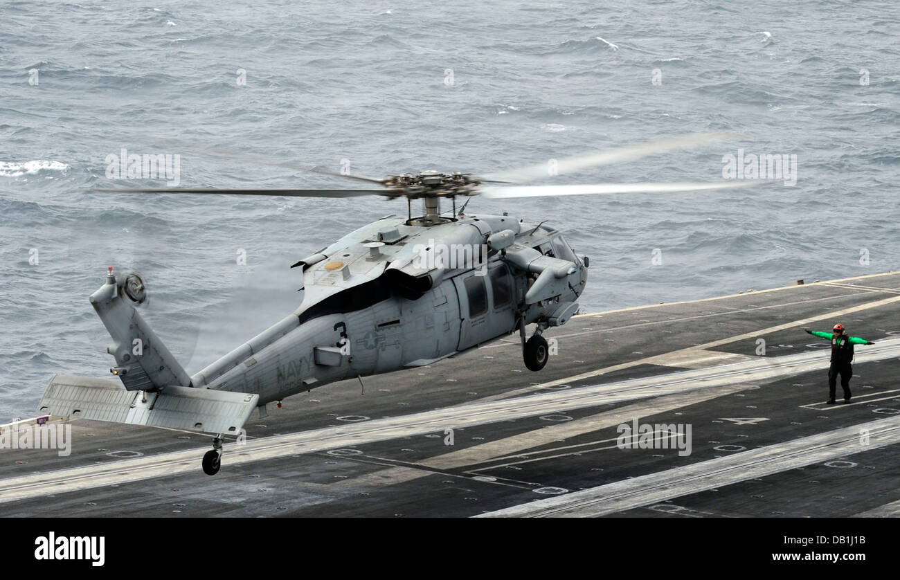 An MH-60S Sea Hawk helicopter assigned to the Indians of Helicopter Sea ...