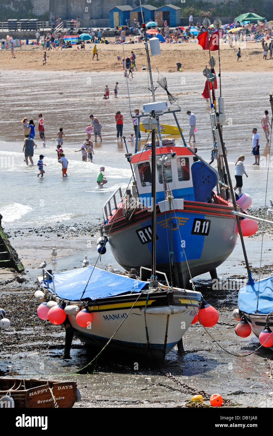 Broadstairs, Kent, England, UK. Fishing boats on the beach at low tide ...
