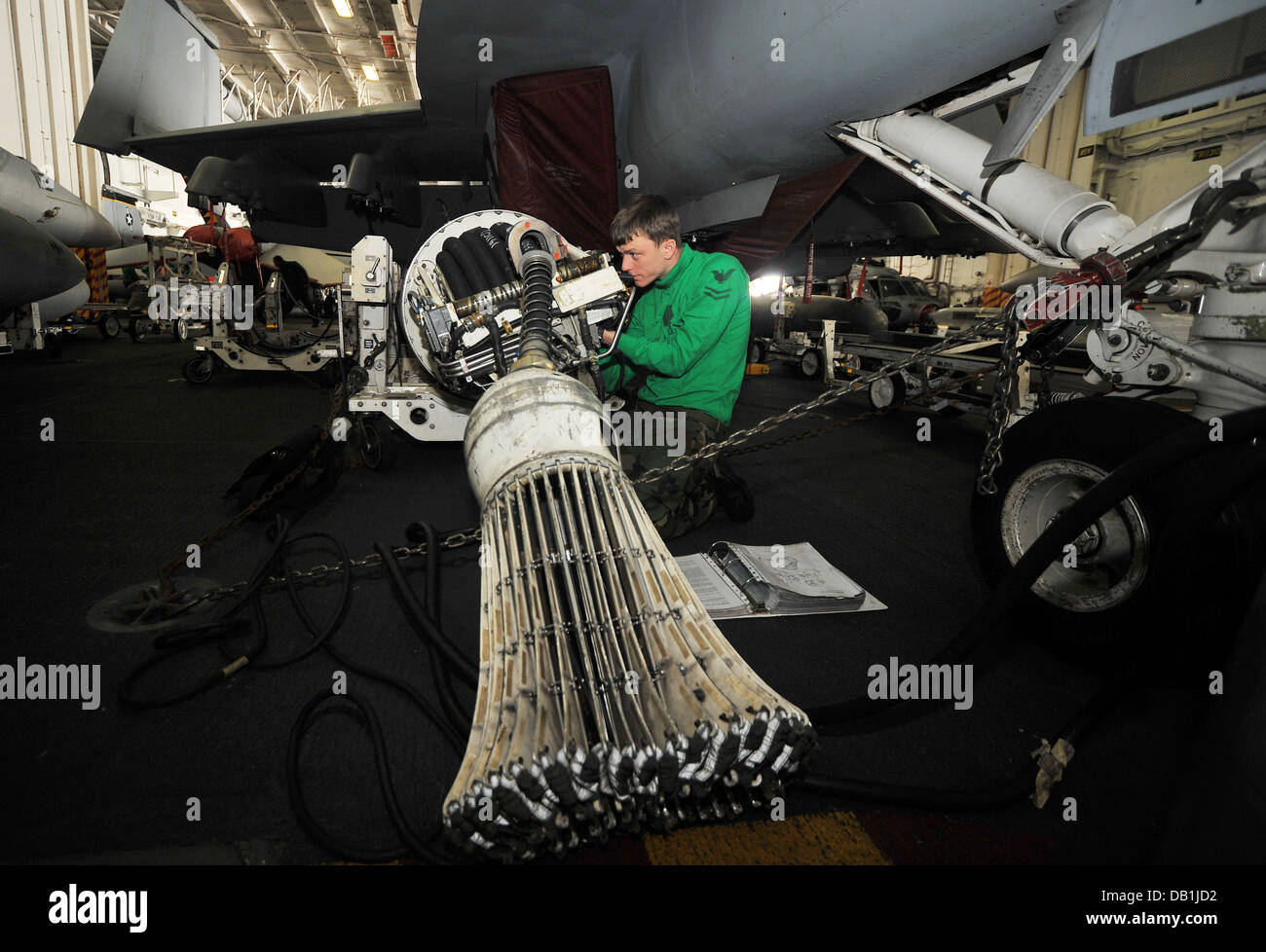 Aviation Machinist's Mate Cory Holiday, from Tampa, Fla., troubleshoots ...