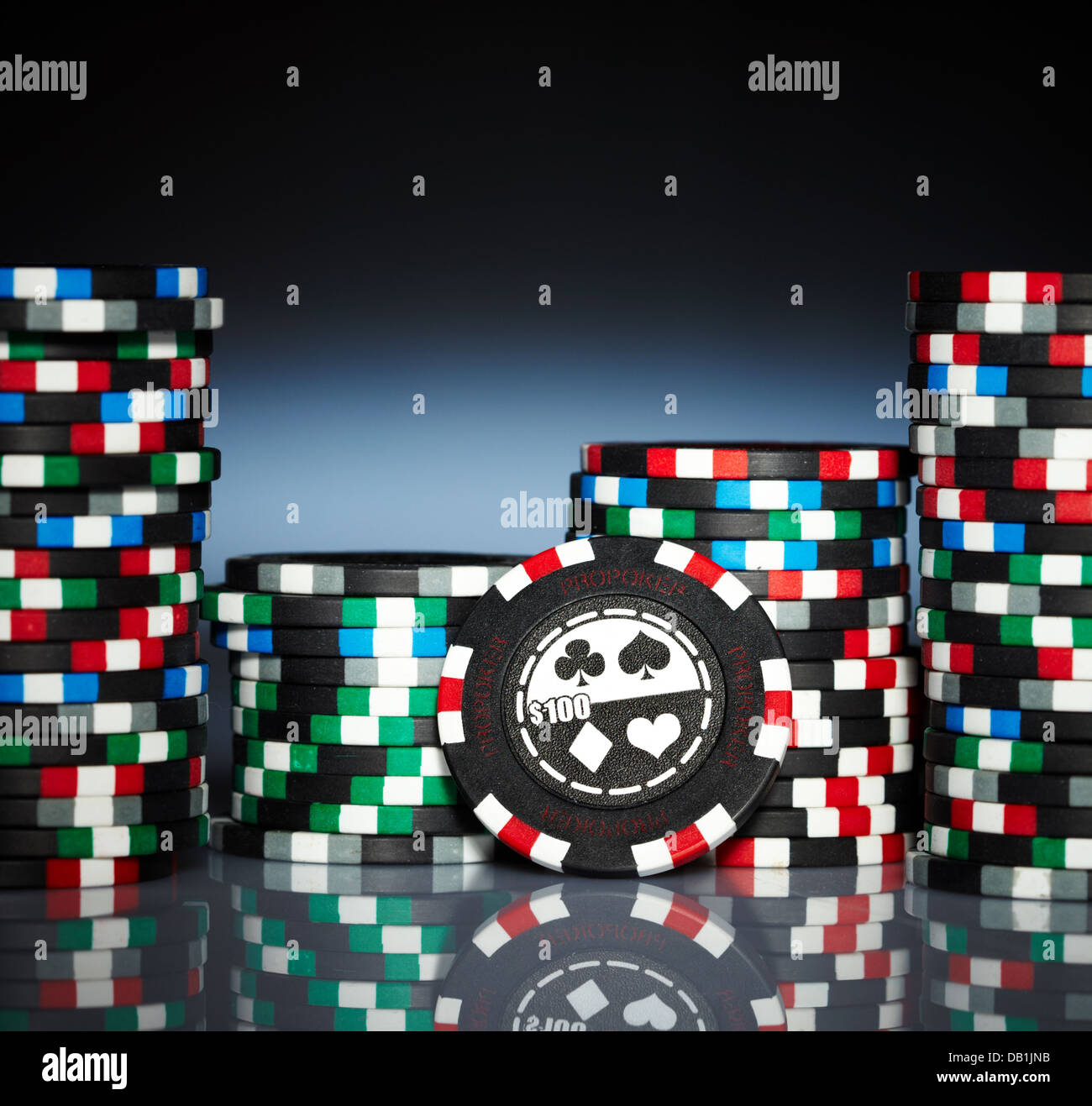 Photo gambling chips on the dark Stock Photo - Alamy