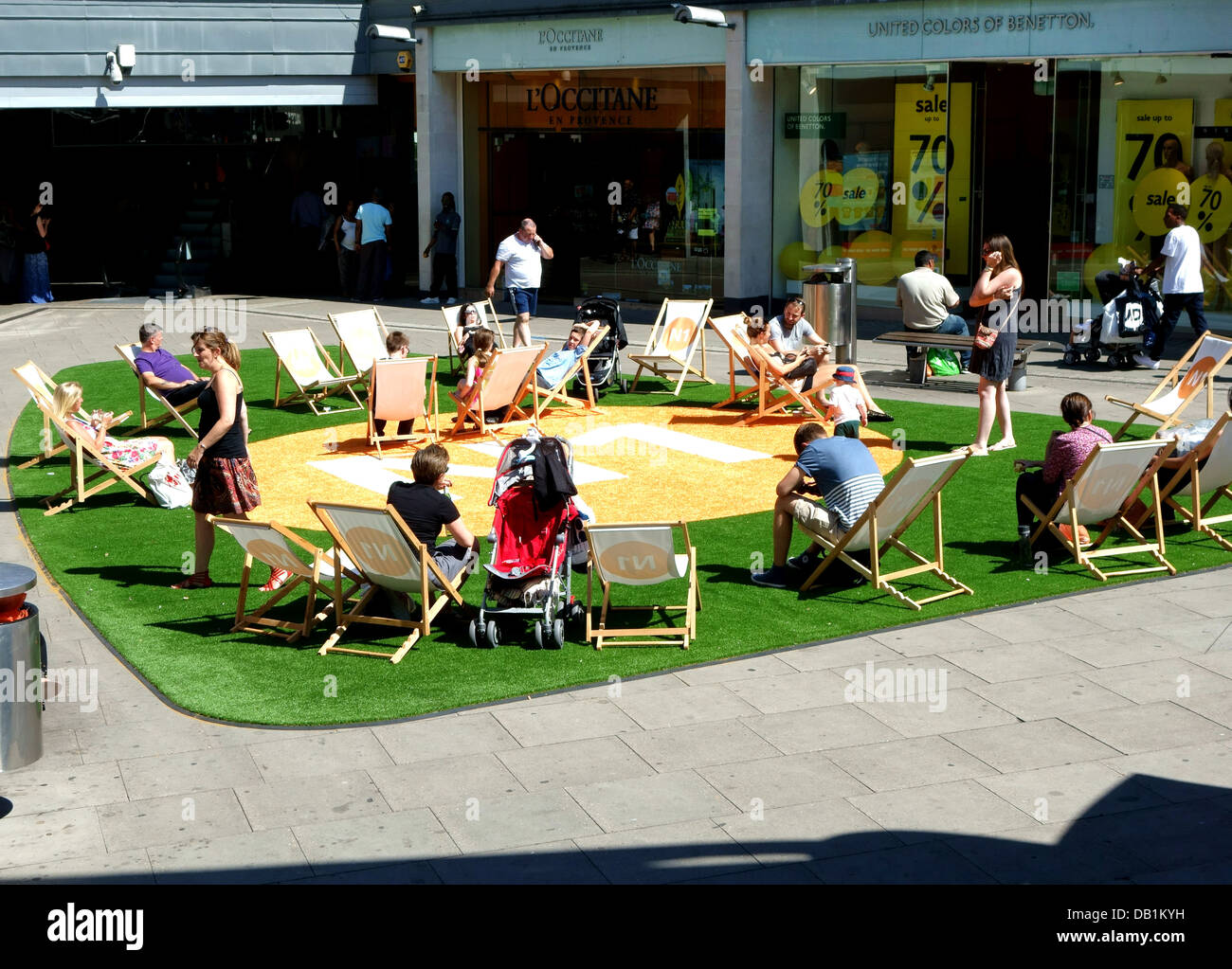 Artificial lawn and deckchairs for hot weather in N1 Centre, Islington ...
