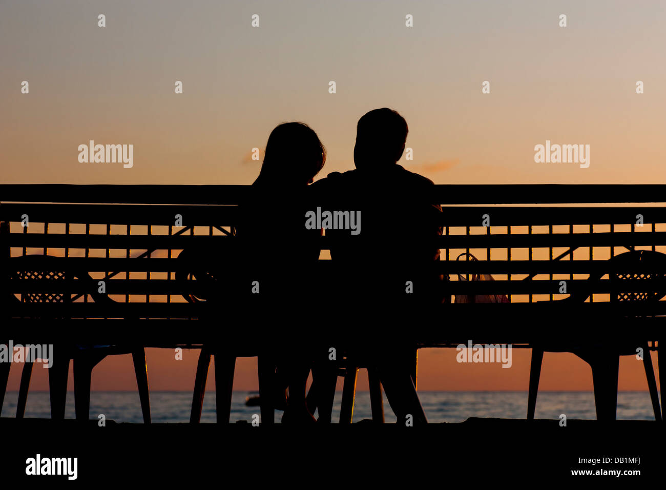 Romantic Couple at Sunset Stock Photo - Alamy