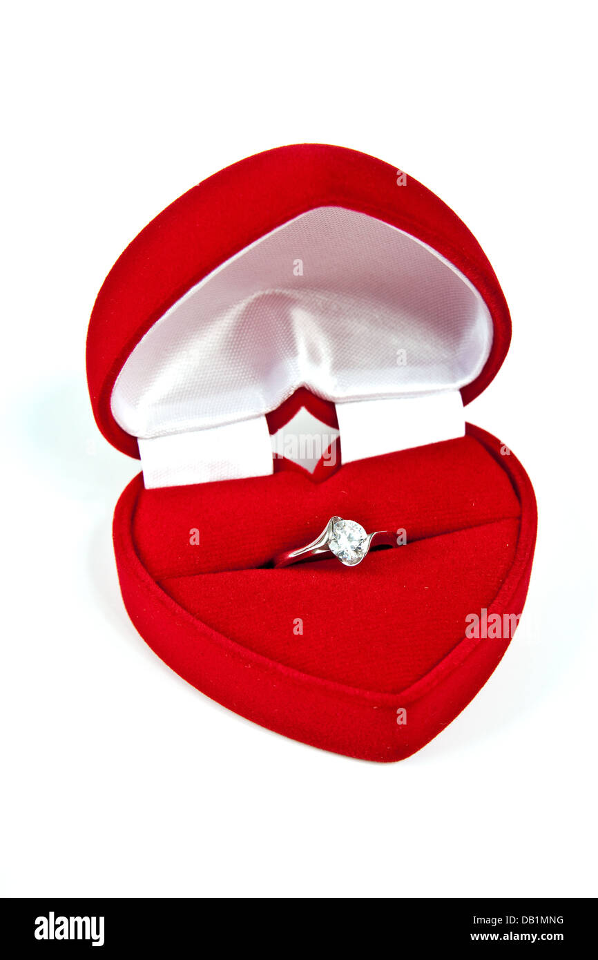 Red velvet box for an engagement ring on white background Stock Photo ...
