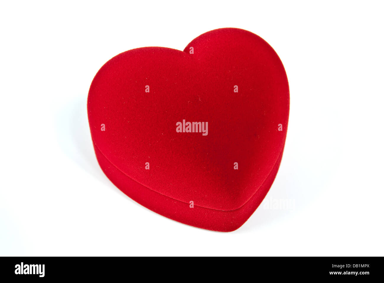 Red velvet box for an engagement ring on white background Stock Photo ...