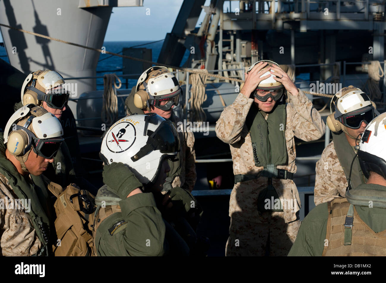 Embarked staff aboard dock landing ship USS Germantown (LSD 42) don ...