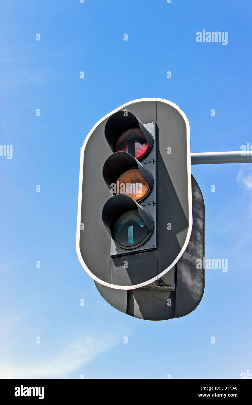 Traffic lights against sky background Stock Photo - Alamy