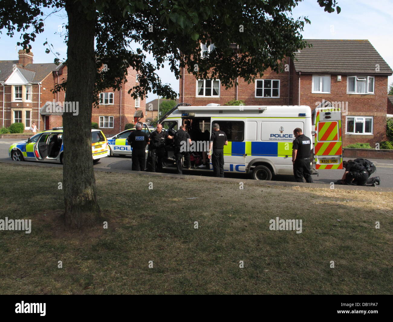 Exeter, UK. 22 July 2013 Police armed response team arrest an armed man ...
