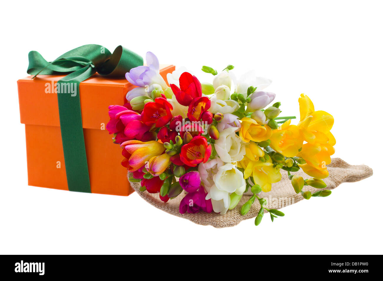 freesia flowers and gift box Stock Photo - Alamy
