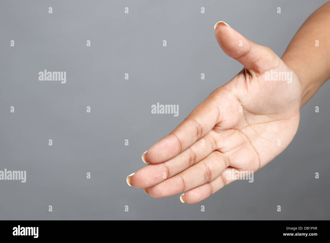woman extending hand for handshake Stock Photo - Alamy