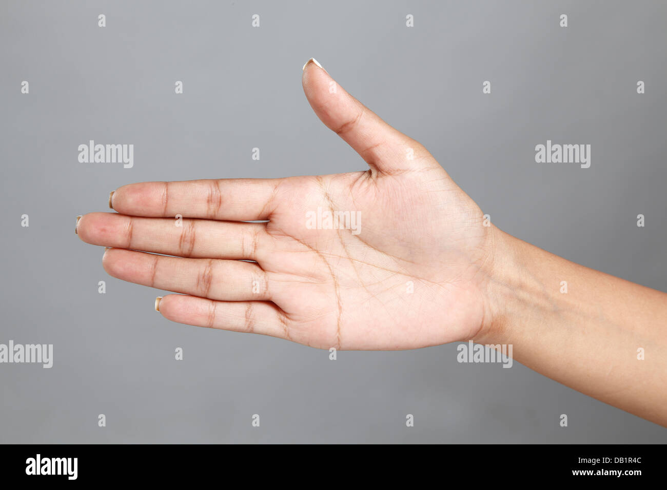woman extending hand for handshake Stock Photo - Alamy