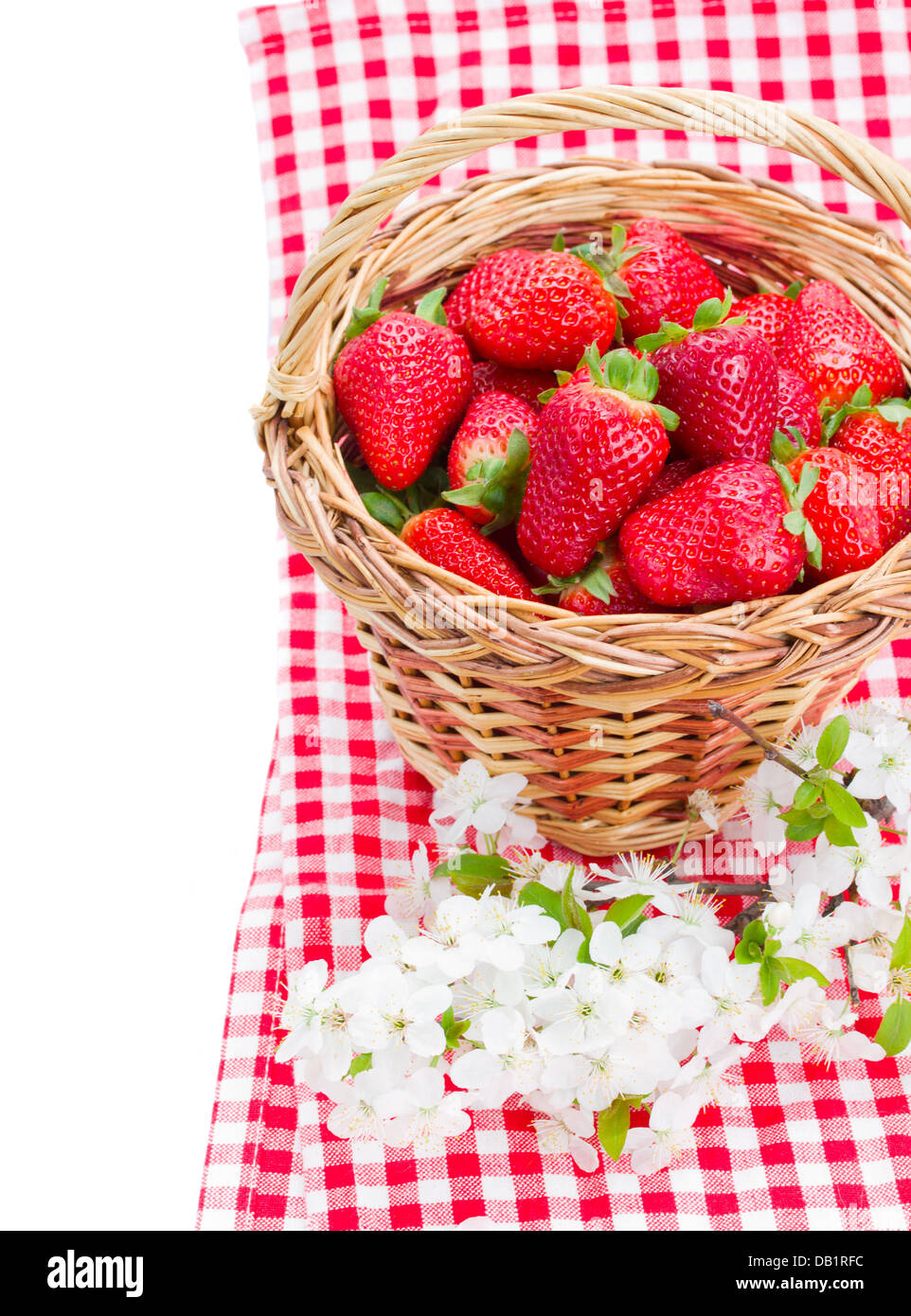 strawberry in basket and flowers Stock Photo - Alamy