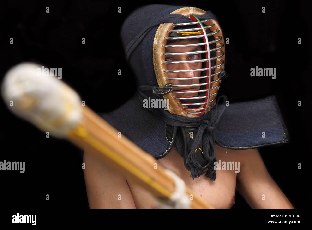kendo man with helmet over black background Stock Photo - Alamy
