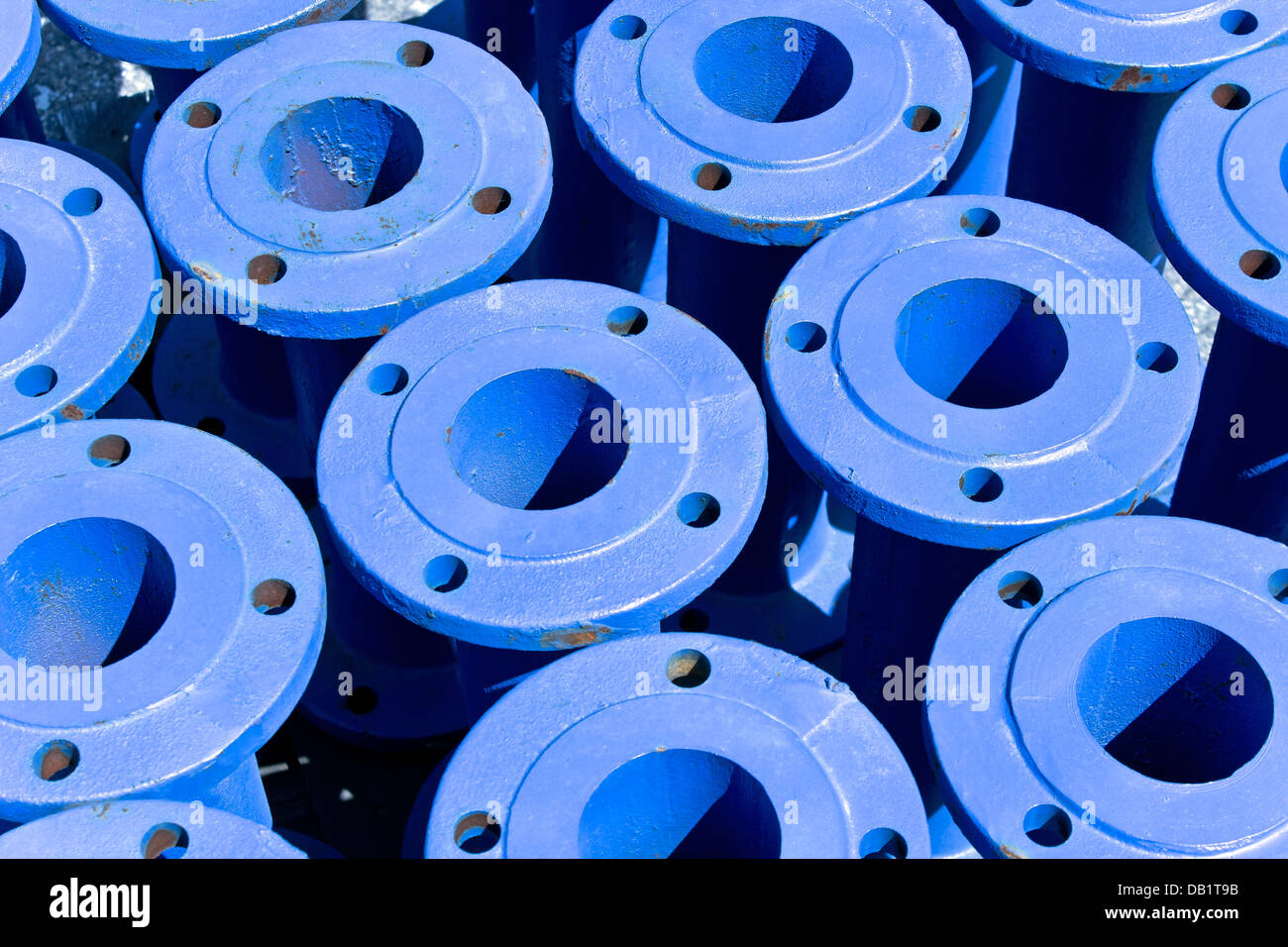 Blue iron pipes as background Stock Photo - Alamy