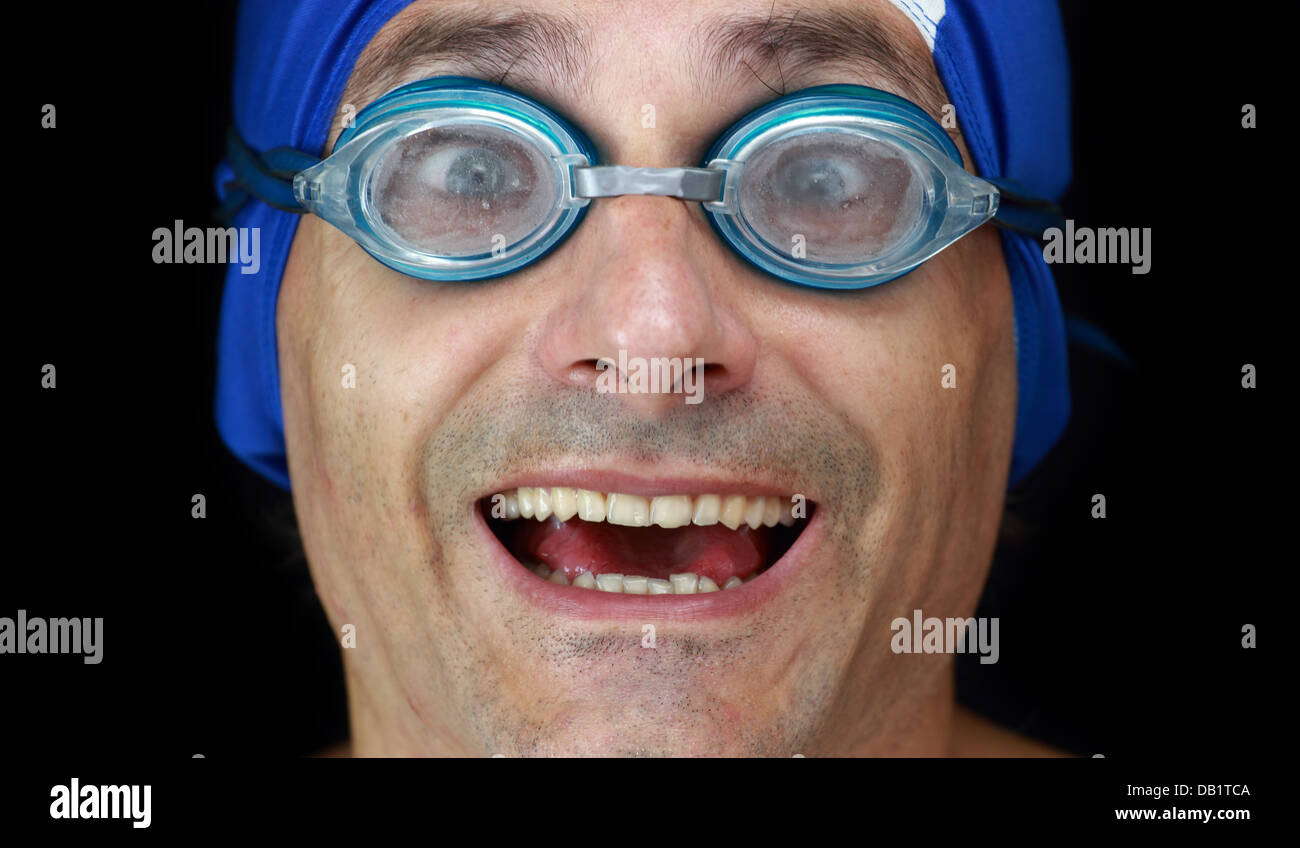 smiling swimmer closeup over black background Stock Photo - Alamy