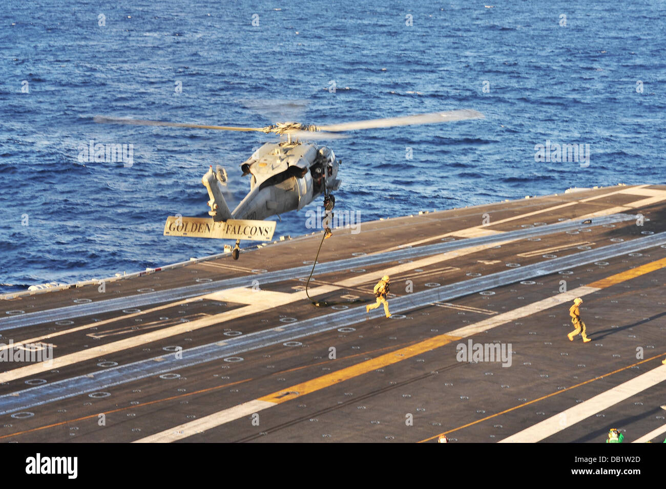 Sailors assigned to Explosive Ordnance Disposal Mobile Unit (EODMU) 5 ...