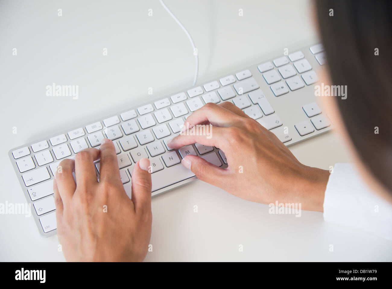 Woman hands type on laptop hi-res stock photography and images - Alamy