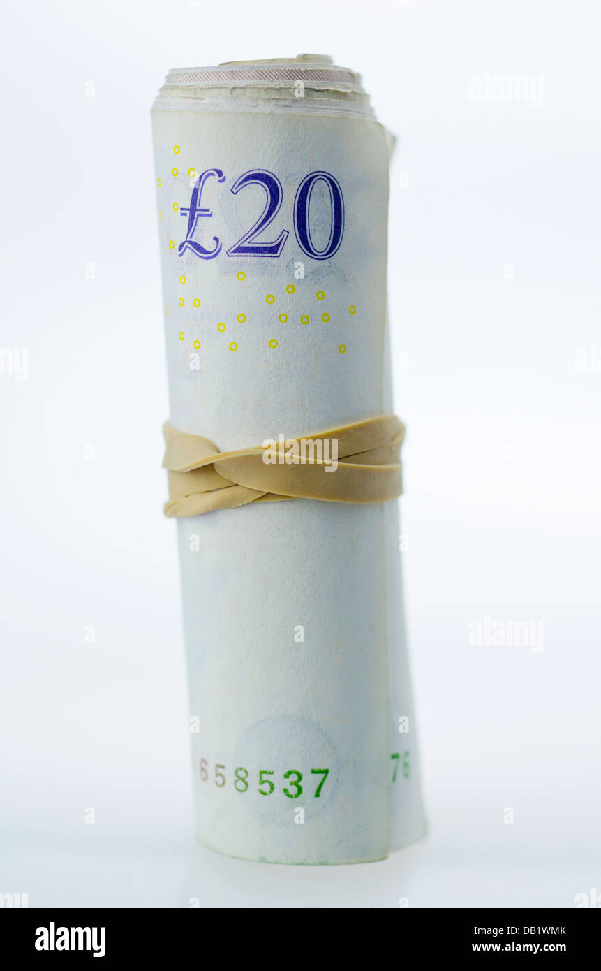 A Roll of Twenty Pound Notes held together with an Elastic Band Stock ...