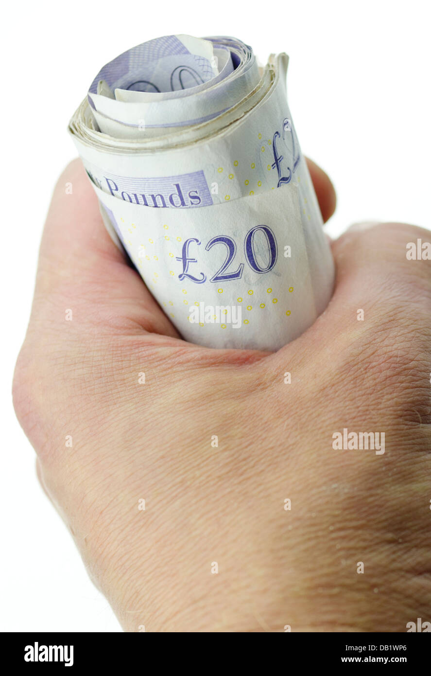 Hand Holding Rolled Up Twenty Pound Notes Stock Photo - Alamy