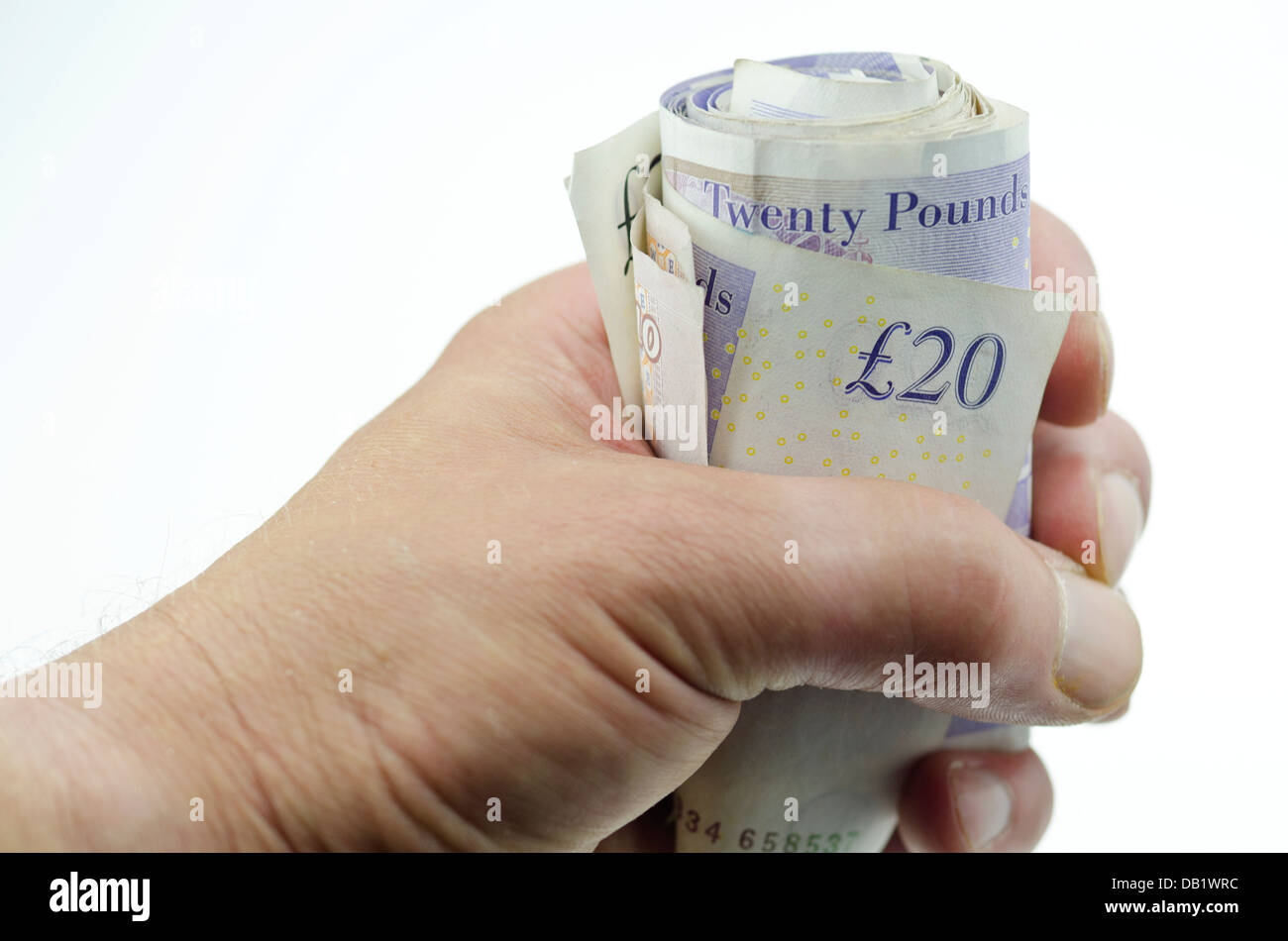 Hand pound notes hi-res stock photography and images - Alamy