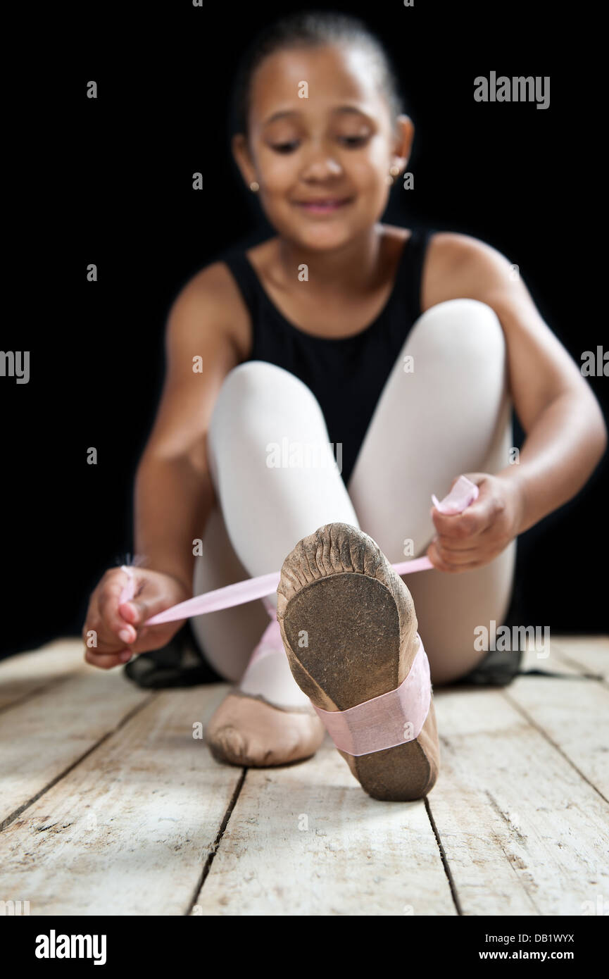 Young ballerina girl in a low key studio. More poses available Stock ...