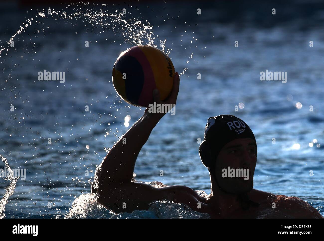 Mihnea Chioveanu of Romania controls the ball during their Men's water ...