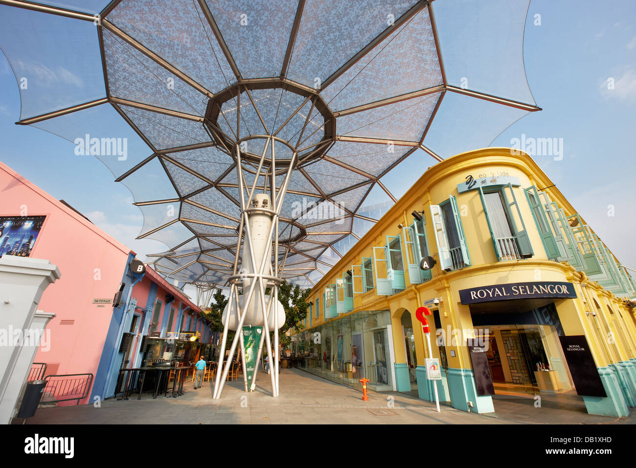 A narrow street with canopy of the outdoor cooling system at Clarke ...