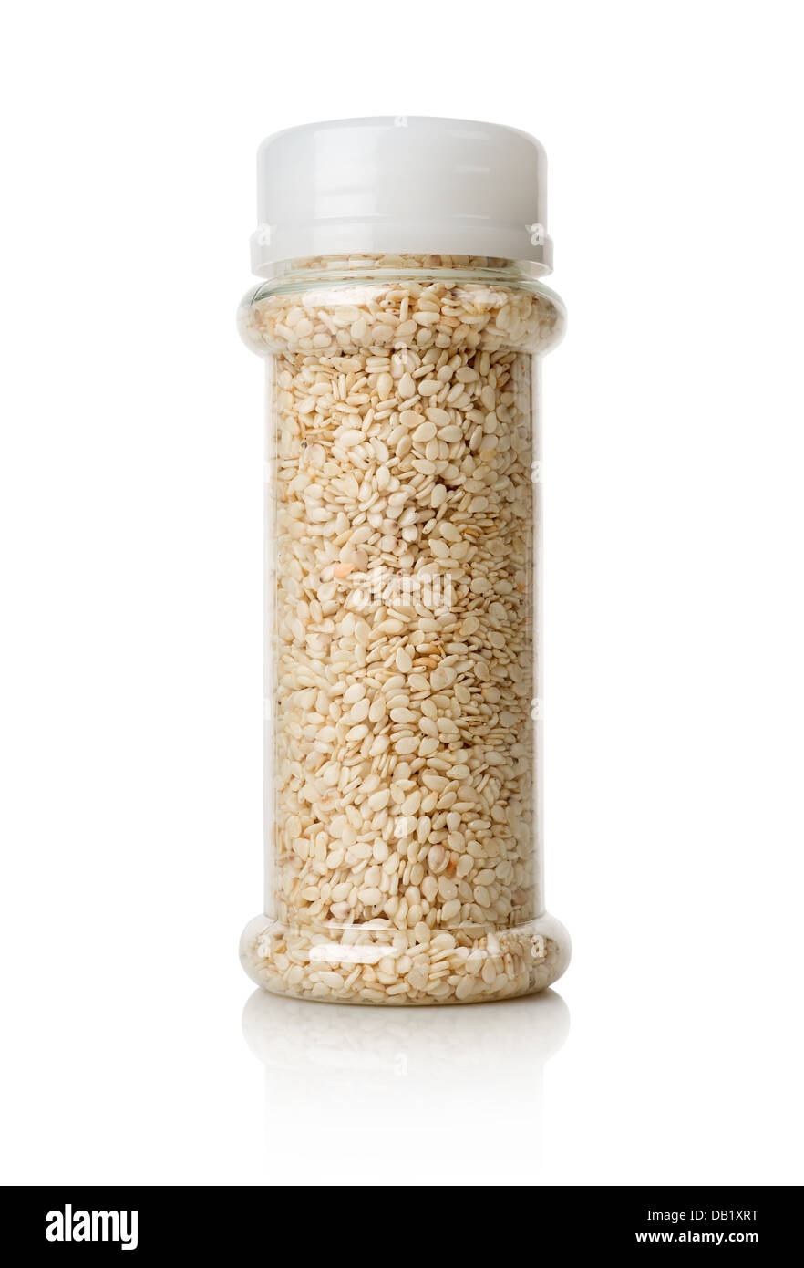 White sesame in a jar isolated on white Stock Photo - Alamy