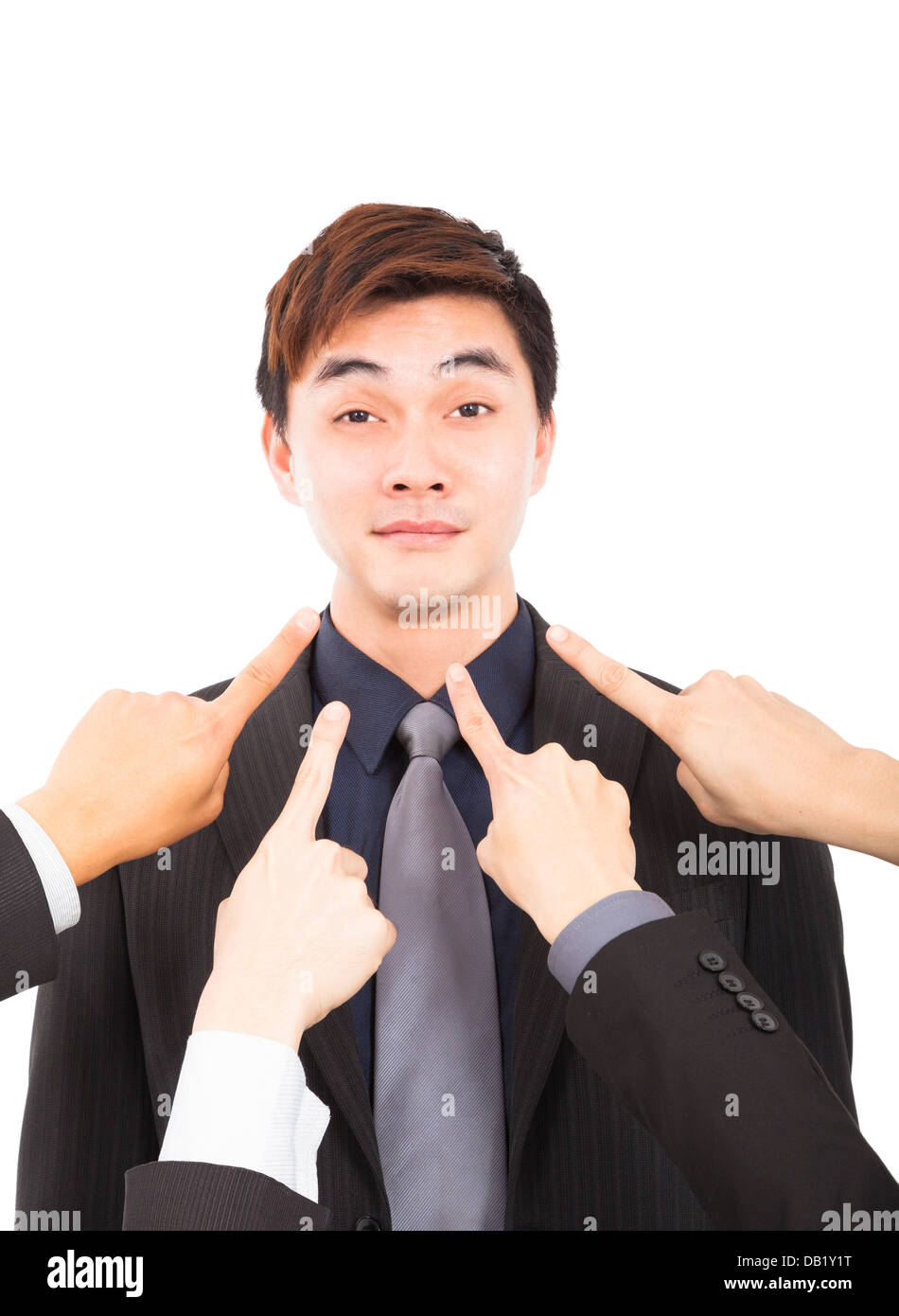 all hands pointing towards businessman Stock Photo - Alamy