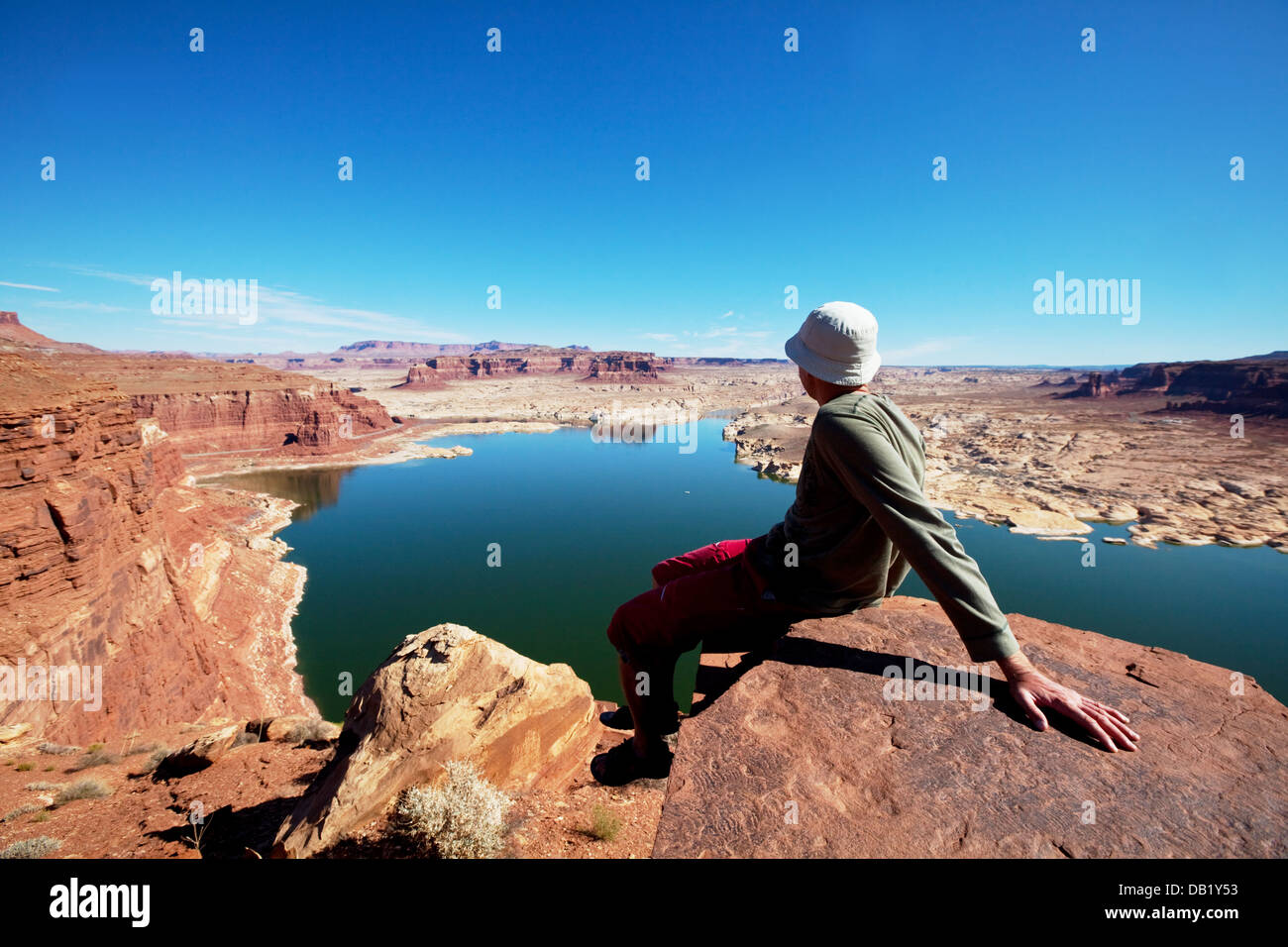 Man on the cliff Stock Photo - Alamy