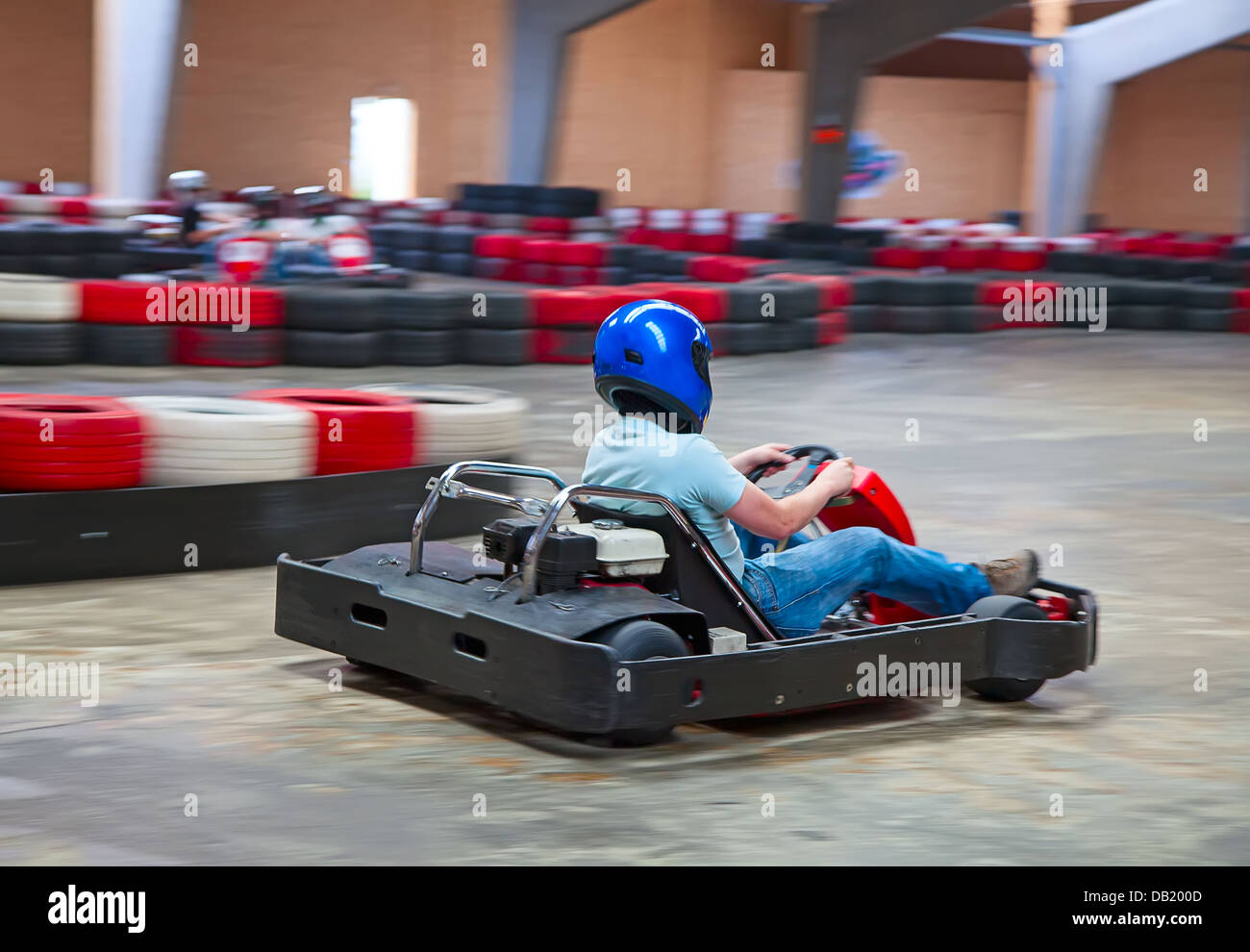 Indoor karting race (kart and safety barriers Stock Photo - Alamy