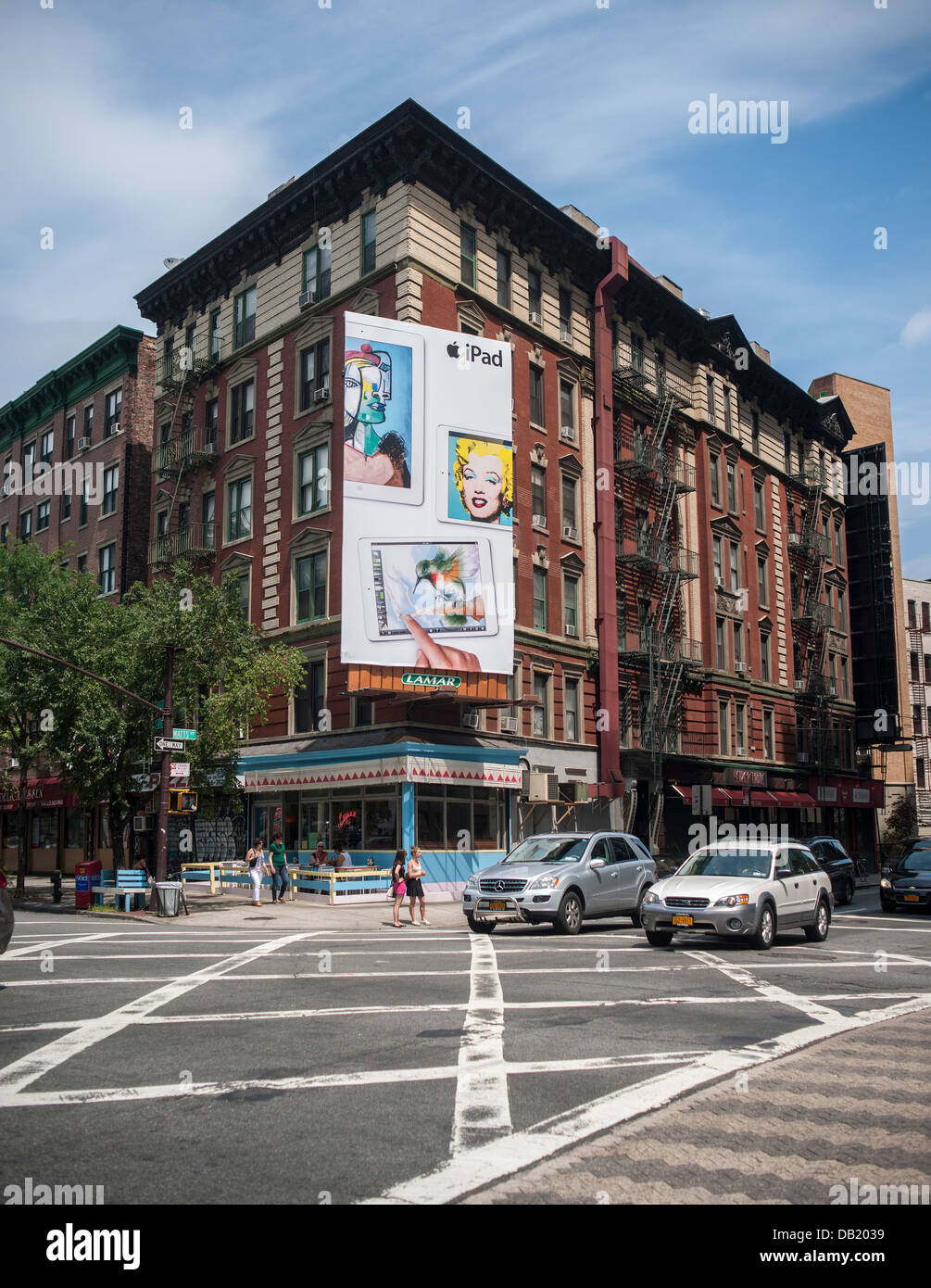 Advertising for the Apple Inc. iPad on a billboard in the Soho ...