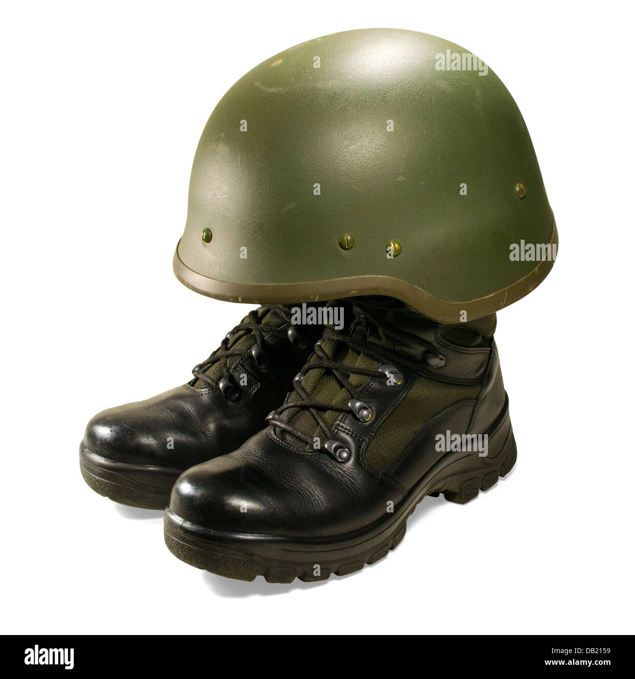 Soldier and army attributes: military boots and helmet. Isolated on ...