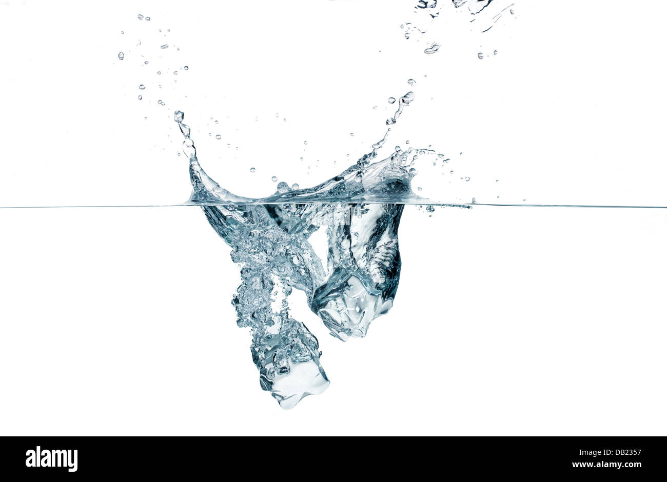 Two Ice Cube Dropping Stock Photo - Alamy