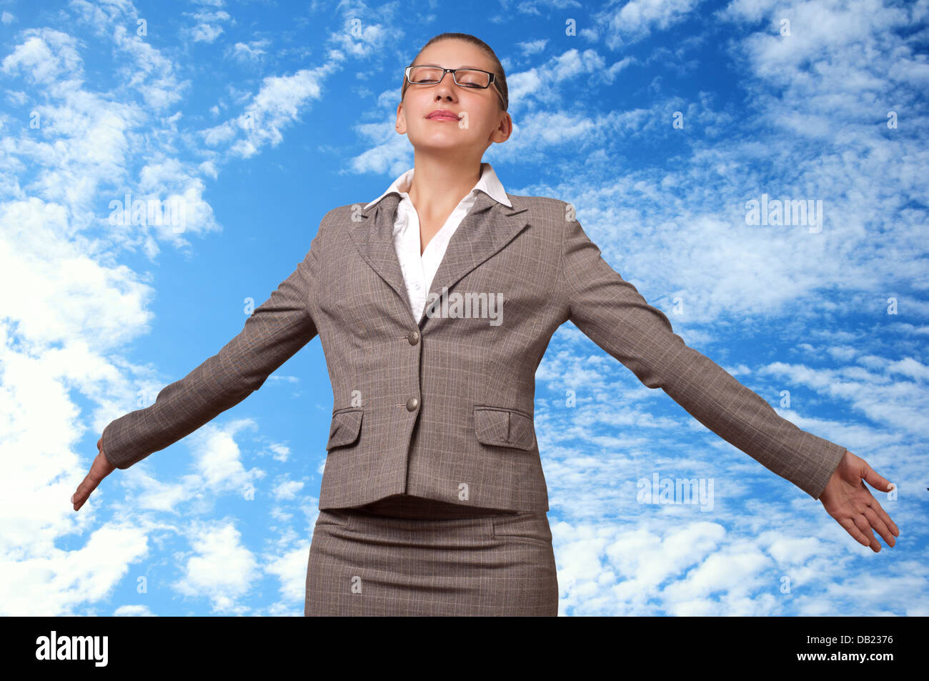 young woman takes off into the sky Stock Photo - Alamy