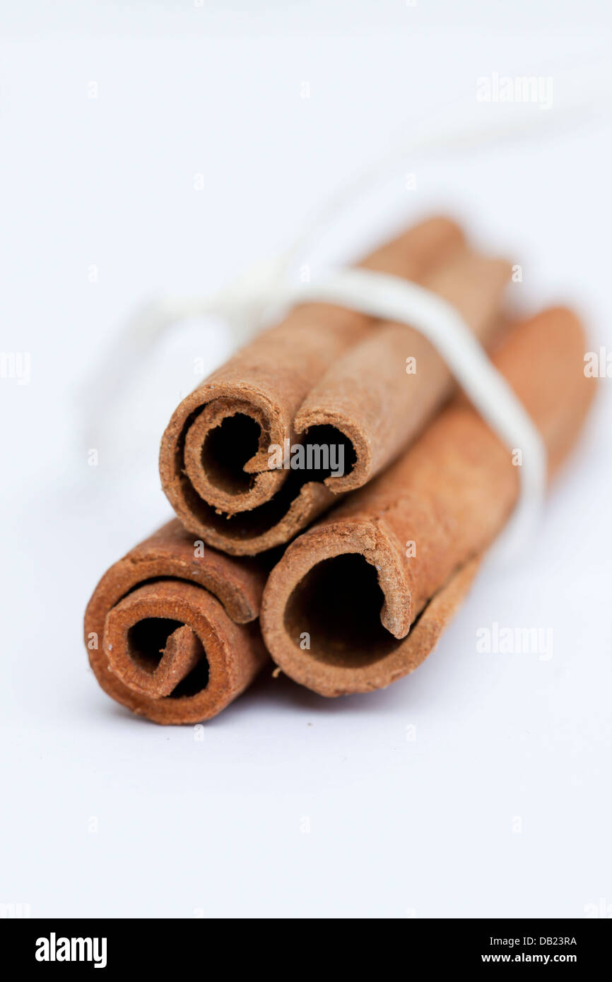Three cinnamon spice Sticks Stock Photo - Alamy