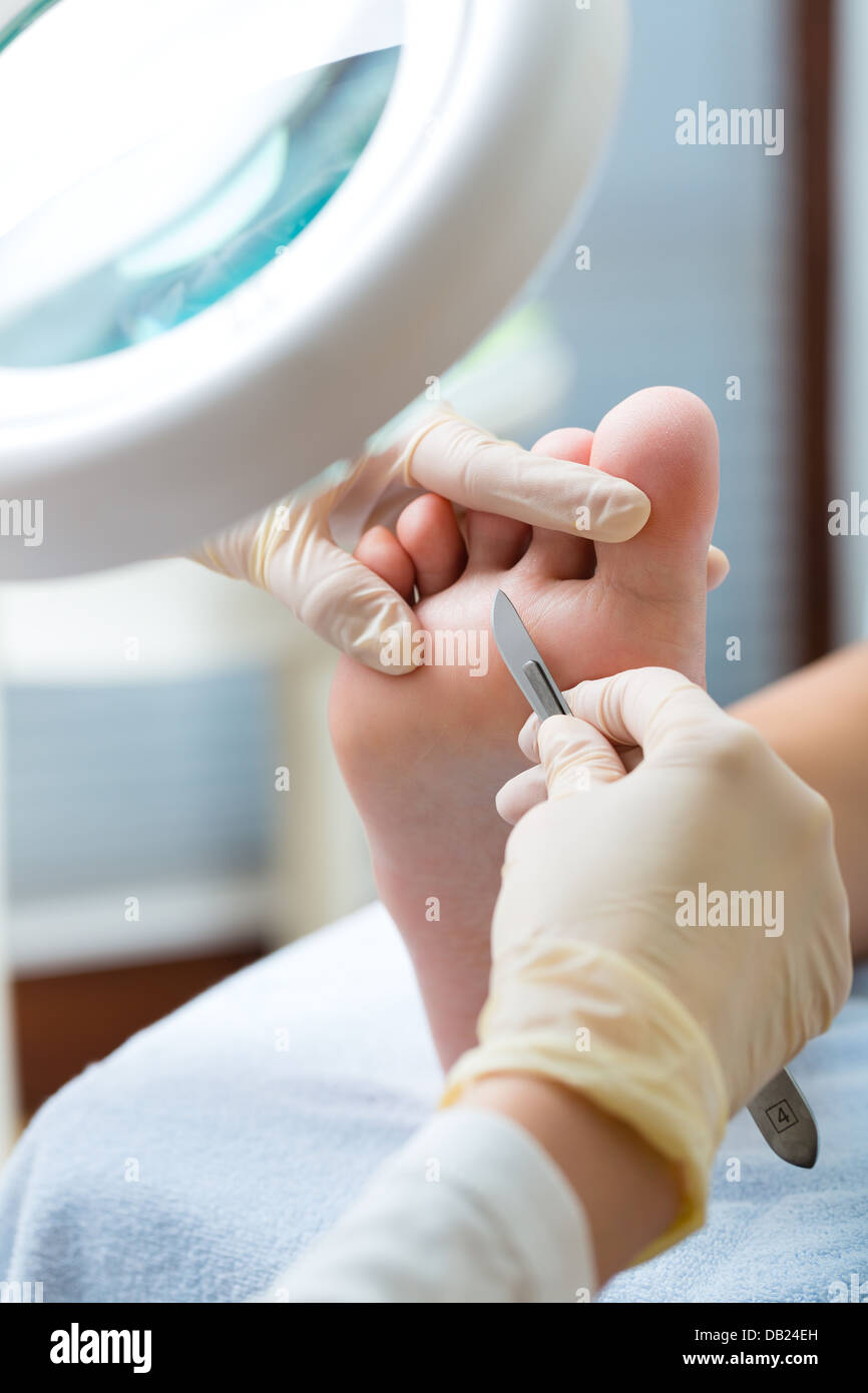 Woman and scalpel hi-res stock photography and images - Alamy