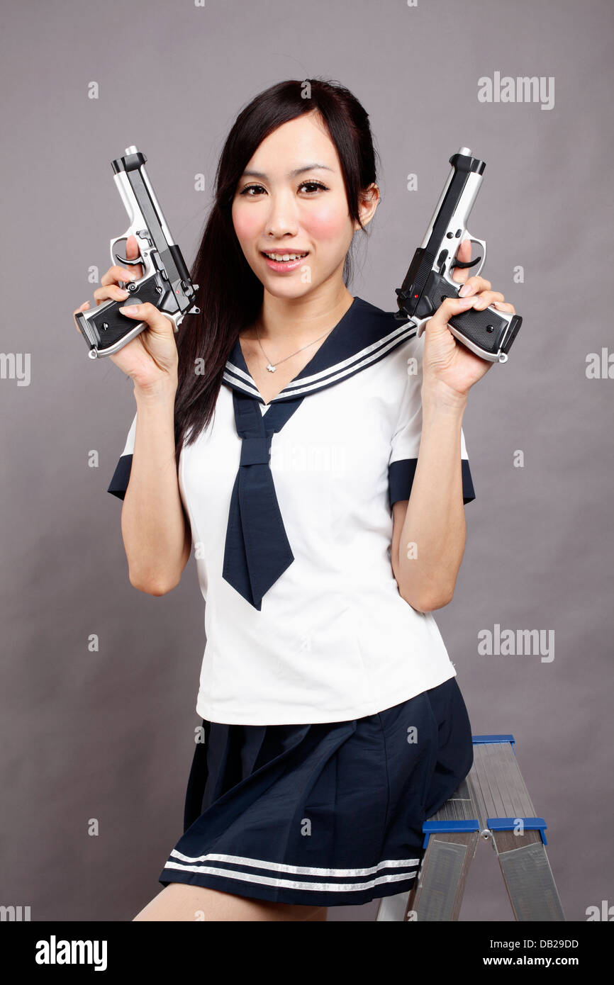 School girl plays gun hi-res stock photography and images - Alamy