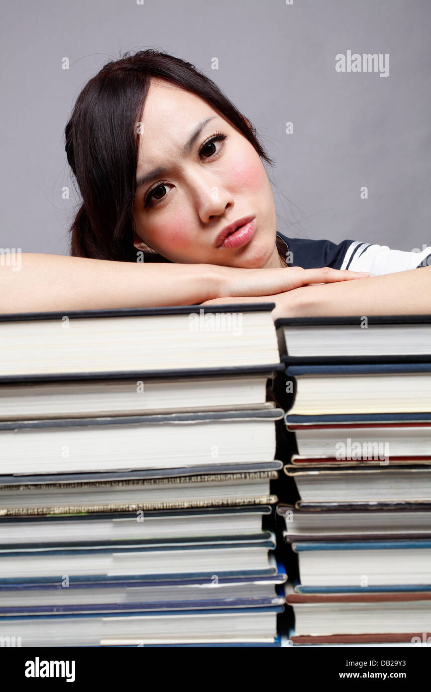 School girl is studying book Stock Photo - Alamy