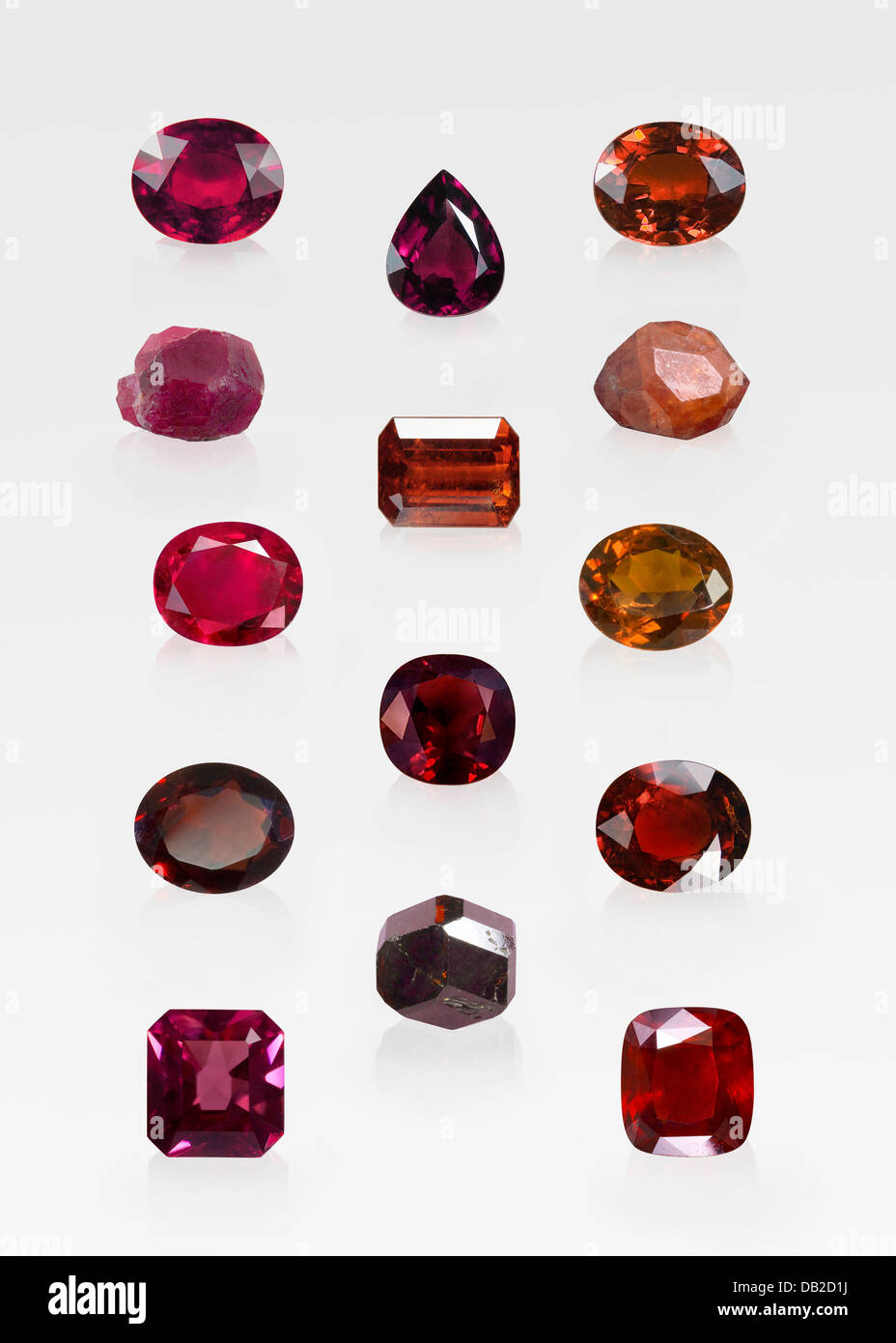 Garnet gemstones on white background Stock Photo - Alamy