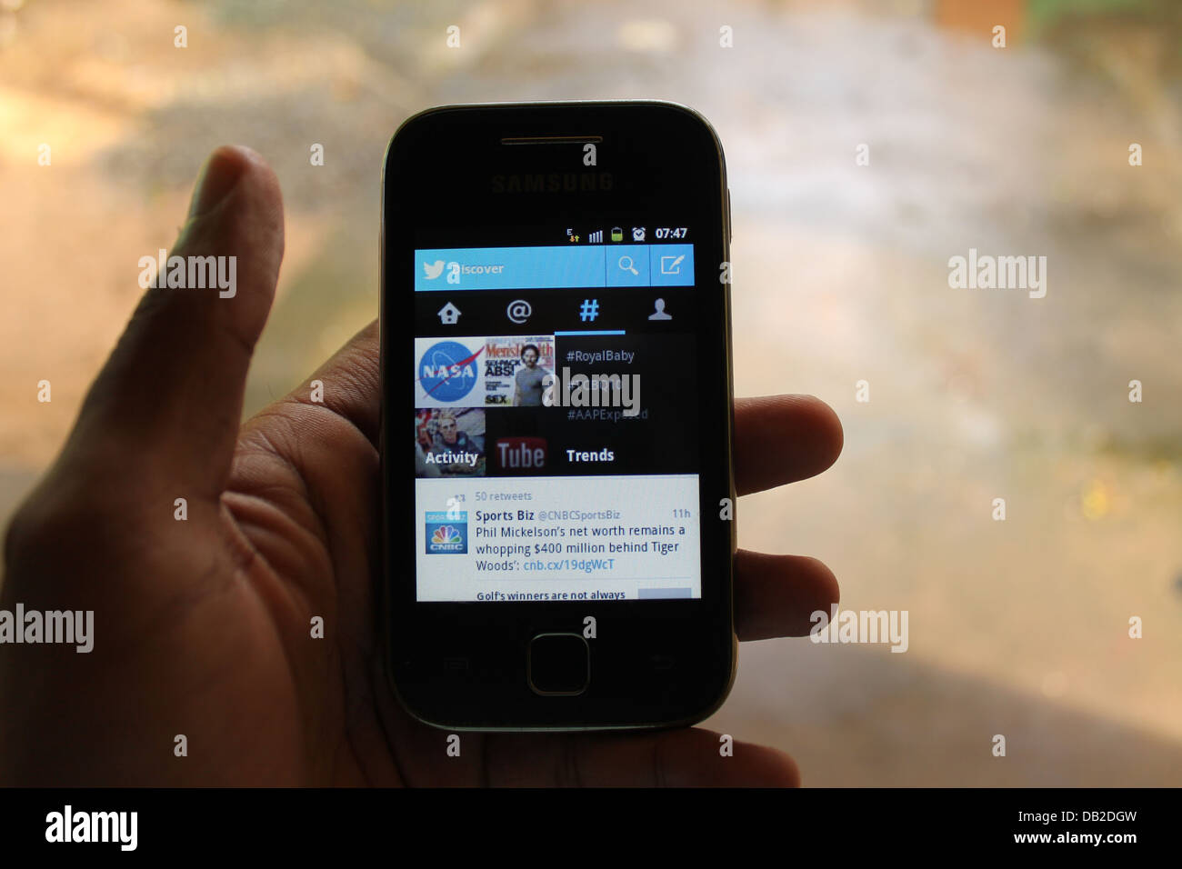 Twitter page on a smartphone Stock Photo - Alamy