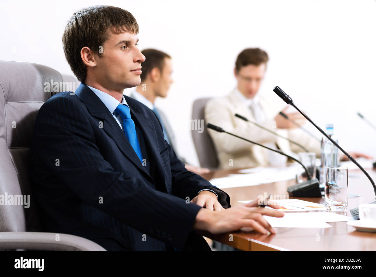 Portrait serious boss sitting table hi-res stock photography and images ...