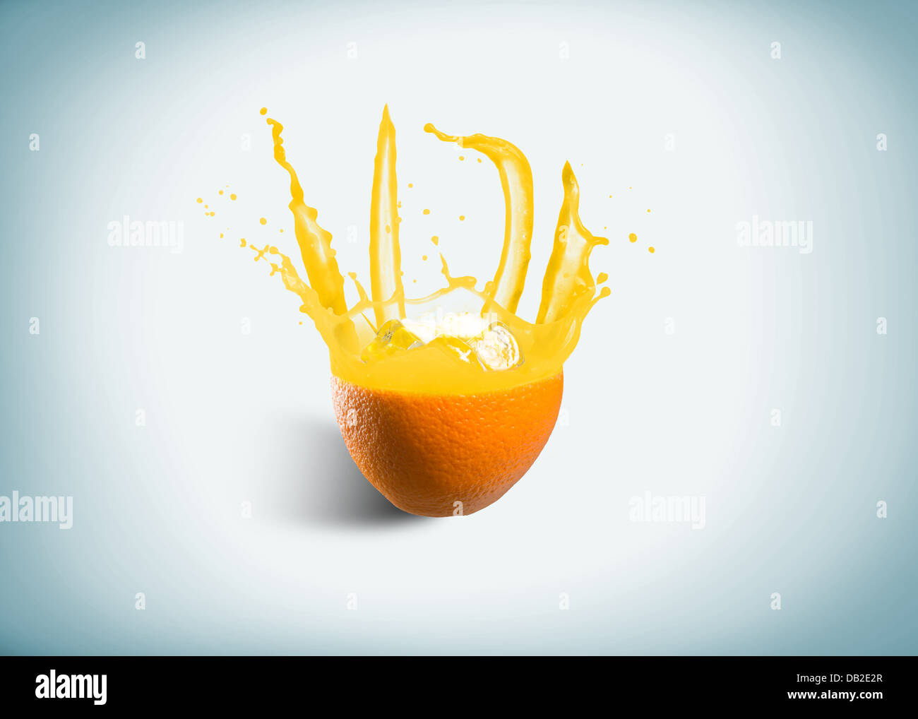 fresh orange juice with a splash Stock Photo - Alamy