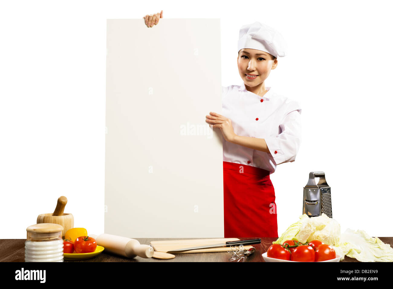 Asian female chef holding poster for the text Stock Photo - Alamy