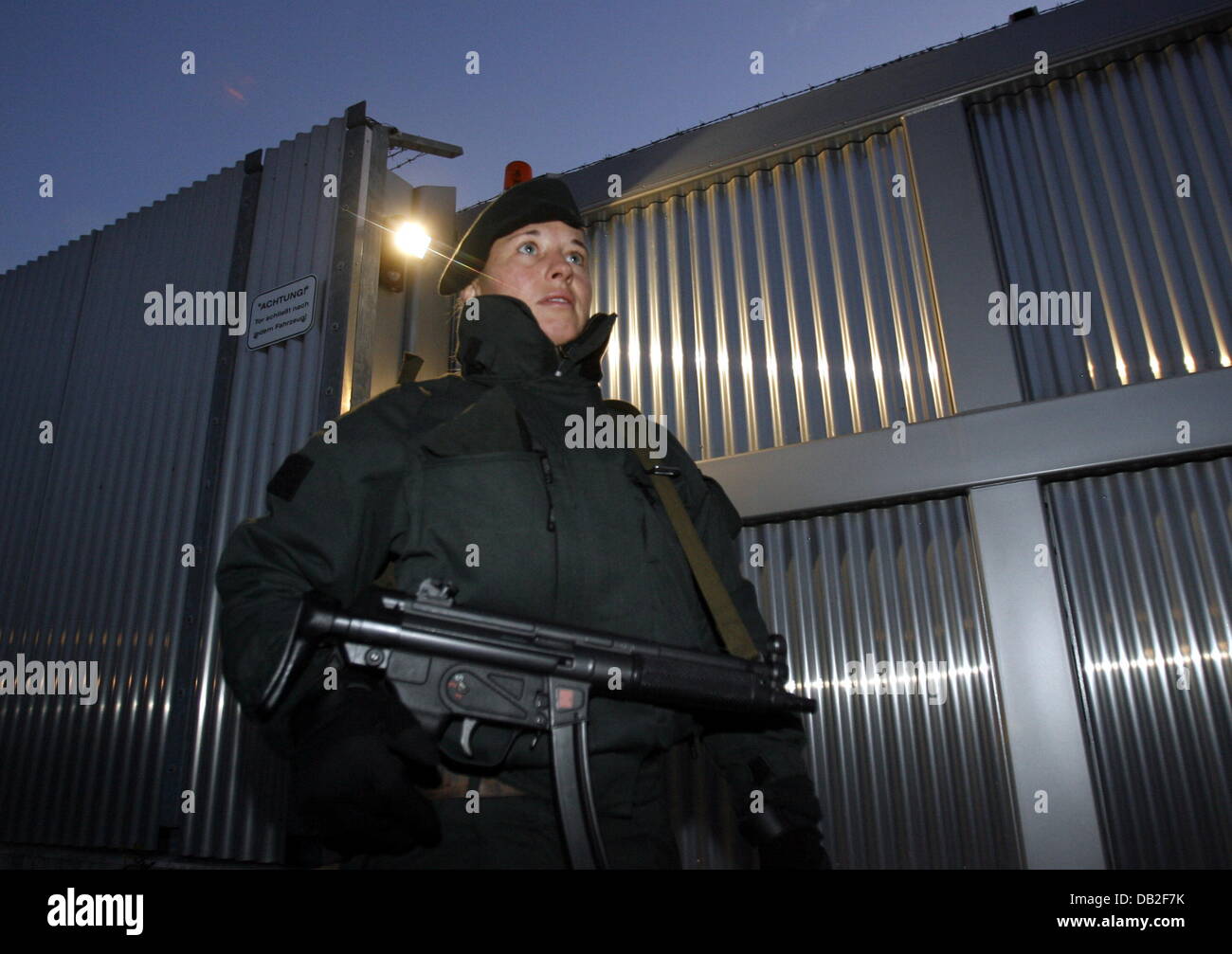 A police officer guards the entrance to the maximum-security wing of ...