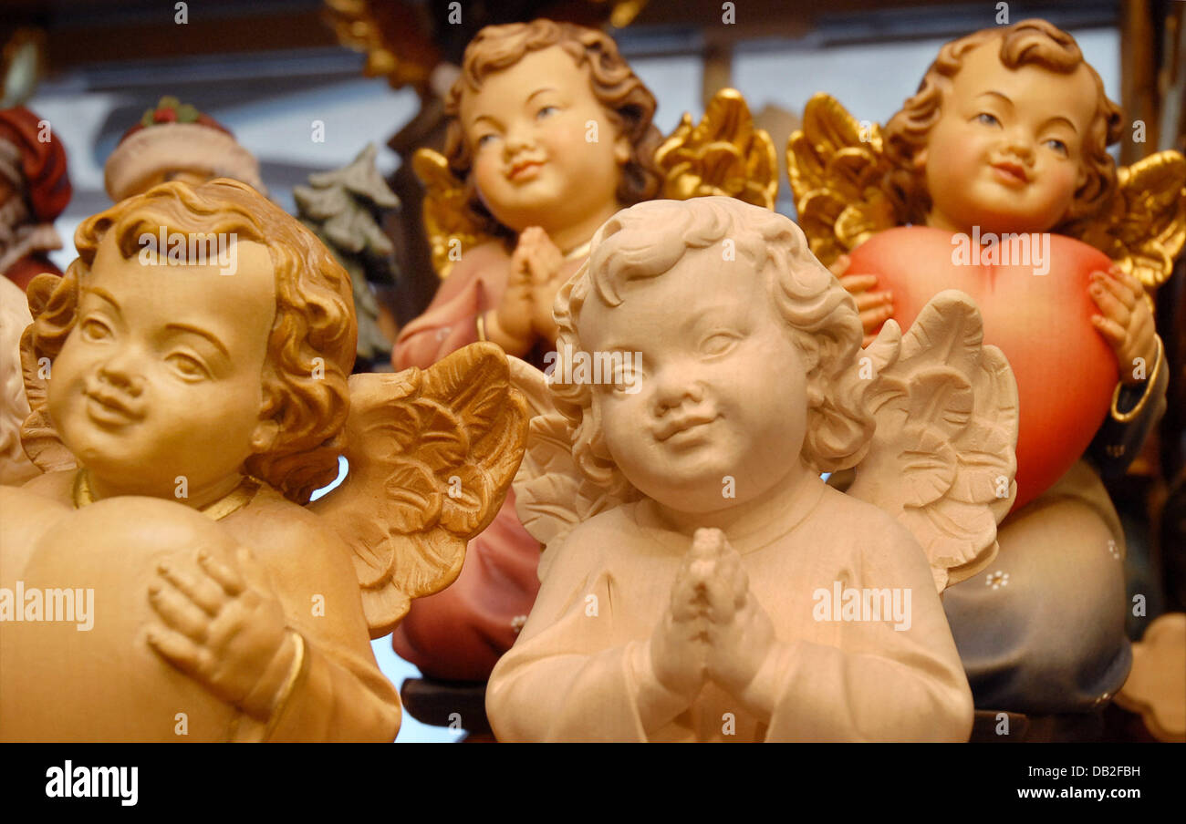 Devotional objects carved from wood pictured in Oberammergau, Germany ...