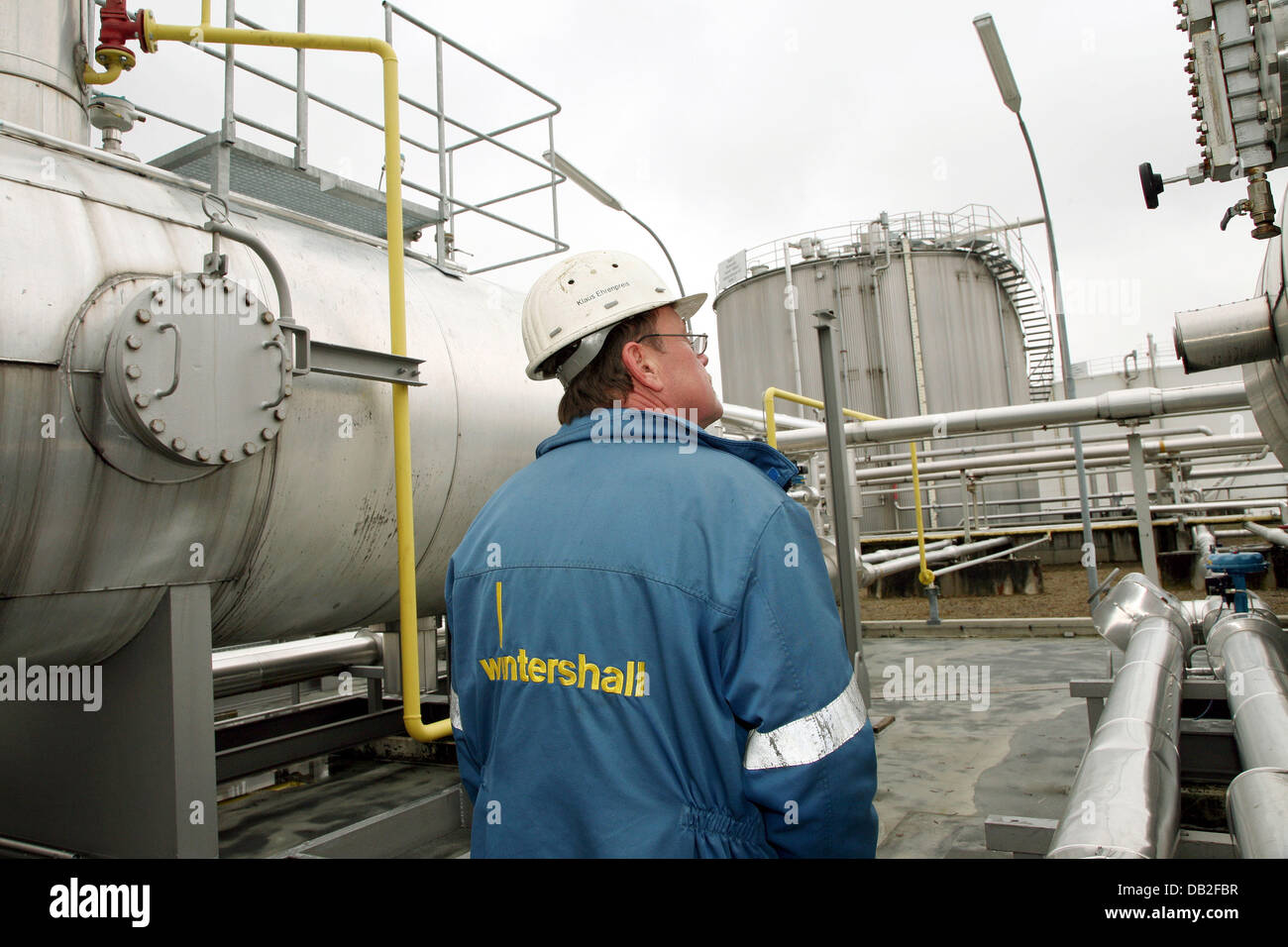 An employee of Wintershall checks the crude oil plant near ...