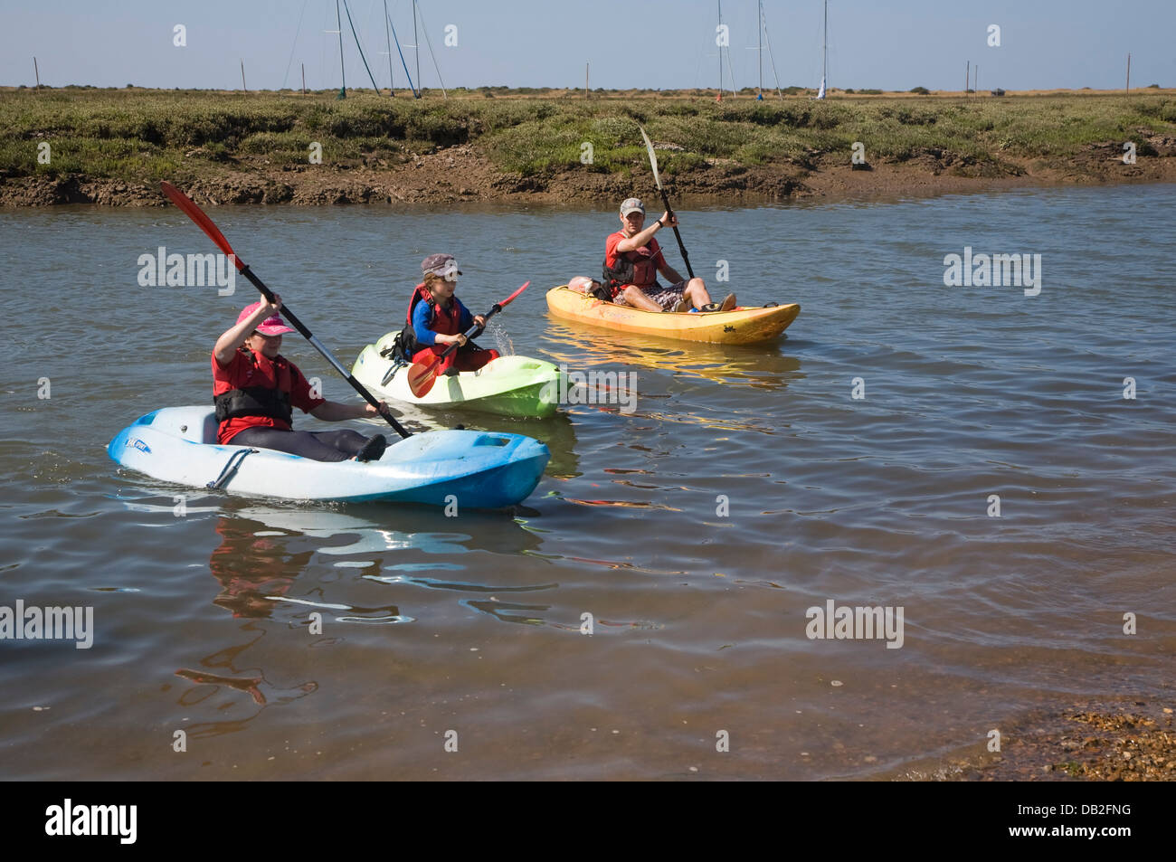 Children kayaking Brancaster Staithe Norfolk England Stock Photo - Alamy